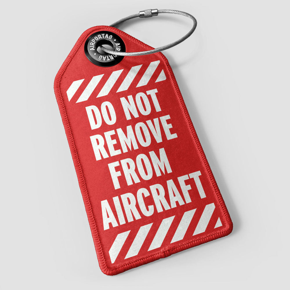 Do not remove from aircraft Crew Tag - Luggage Tag