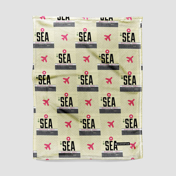 Throw Blanket - SEA airport code pattern.