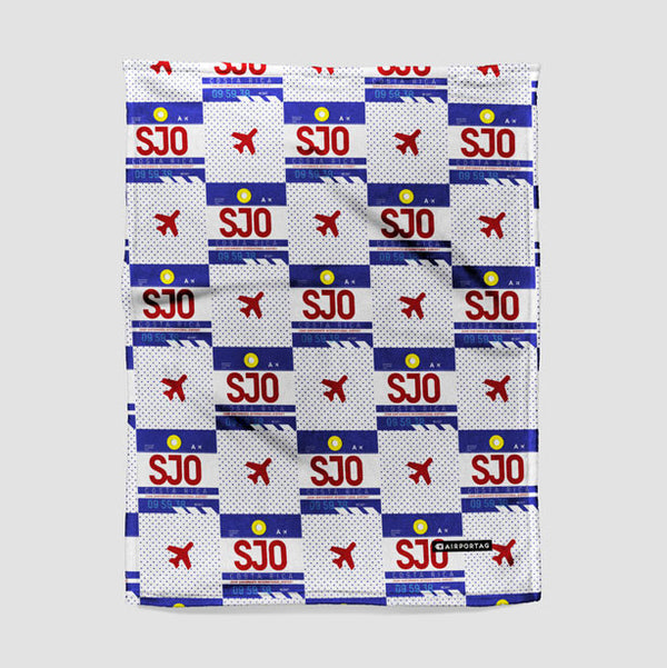 Throw Blanket - SJO airport code pattern.